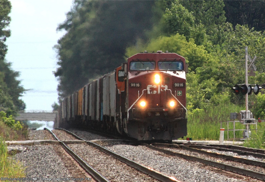 CP 9816 with CSX bauxite train
